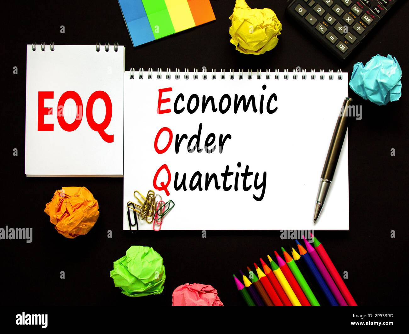 EOQ economic order quantity symbol. Concept words EOQ economic order quantity on white note on ...