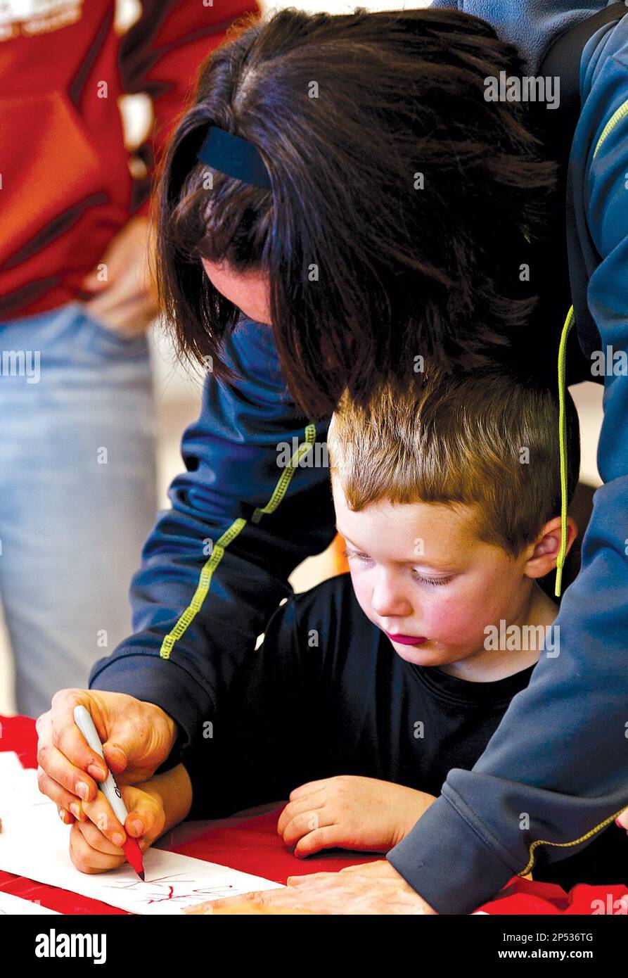 Five-year-old Jackson Murray and his mother, Jacque, design a Hachimaki ...