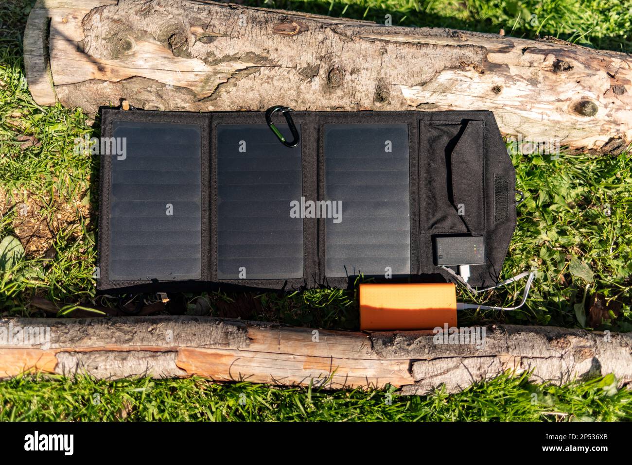 Charging the power bank from the solar panel. Charge the solar panel ...