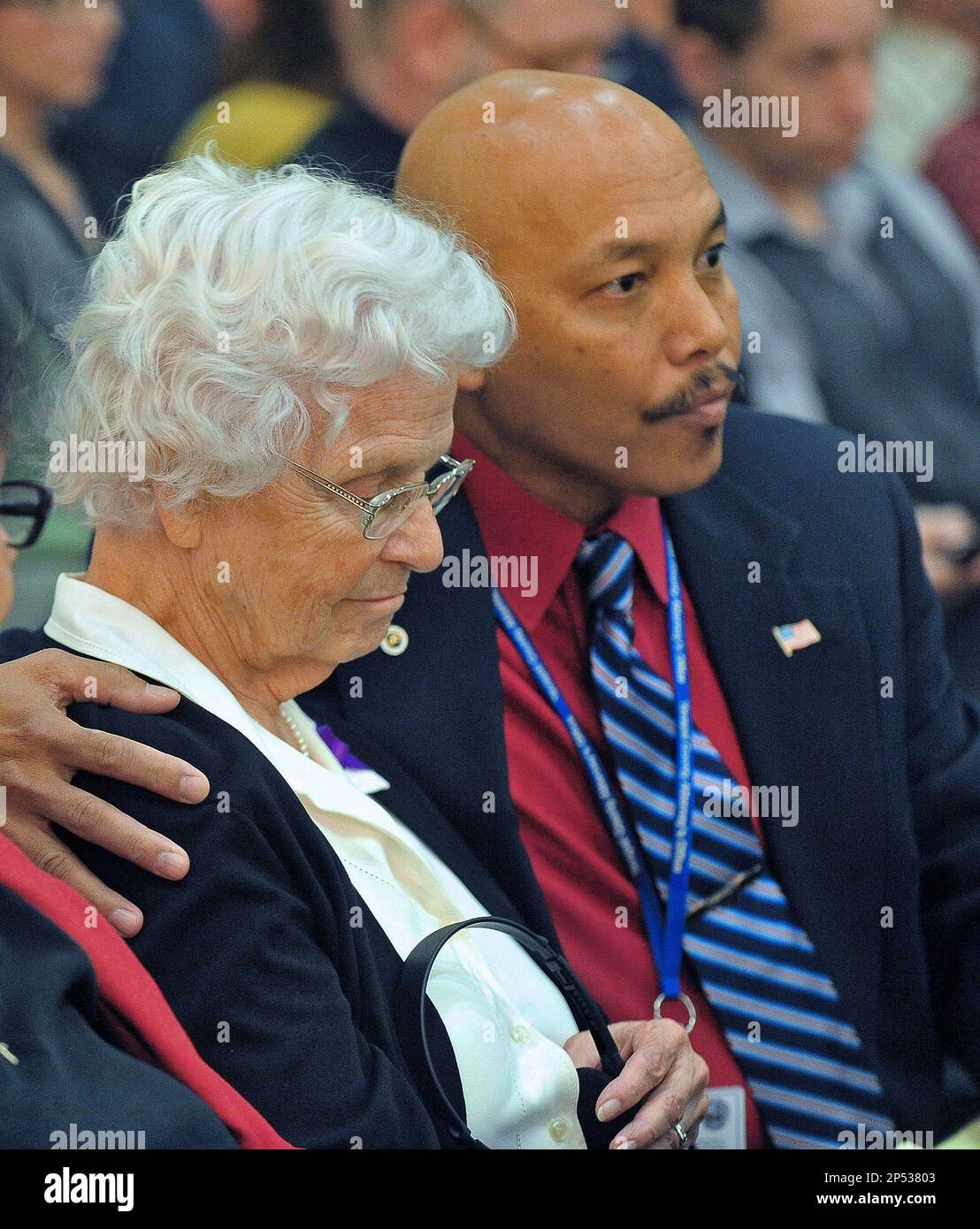 Ruth Kennedy, mother of Carol Kennedy, is comforted by Tony Camacho ...