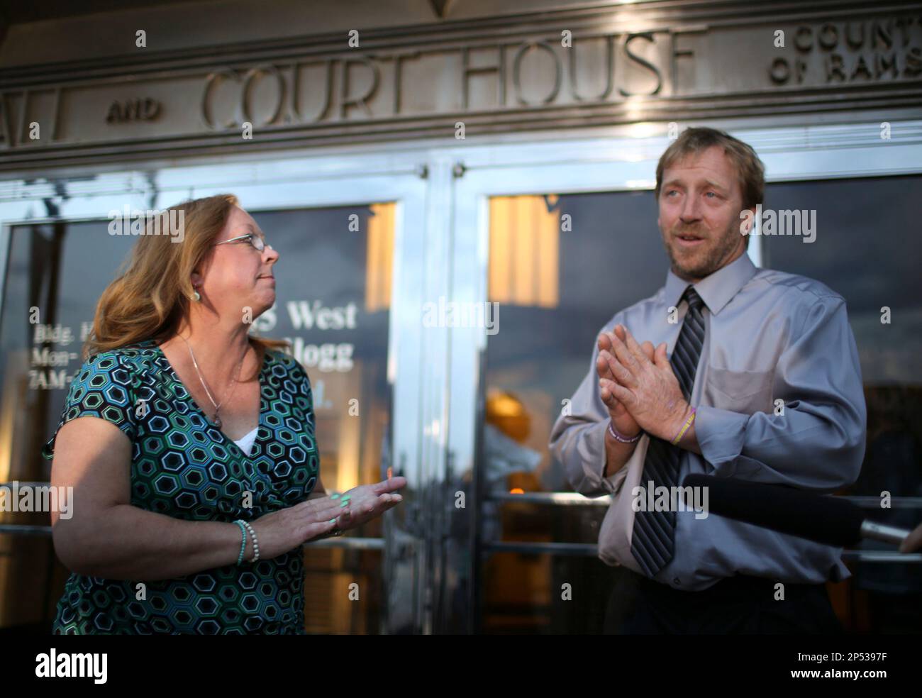Jay, right, and Marcie Steger, parents of Kira Steger, speaks to the ...