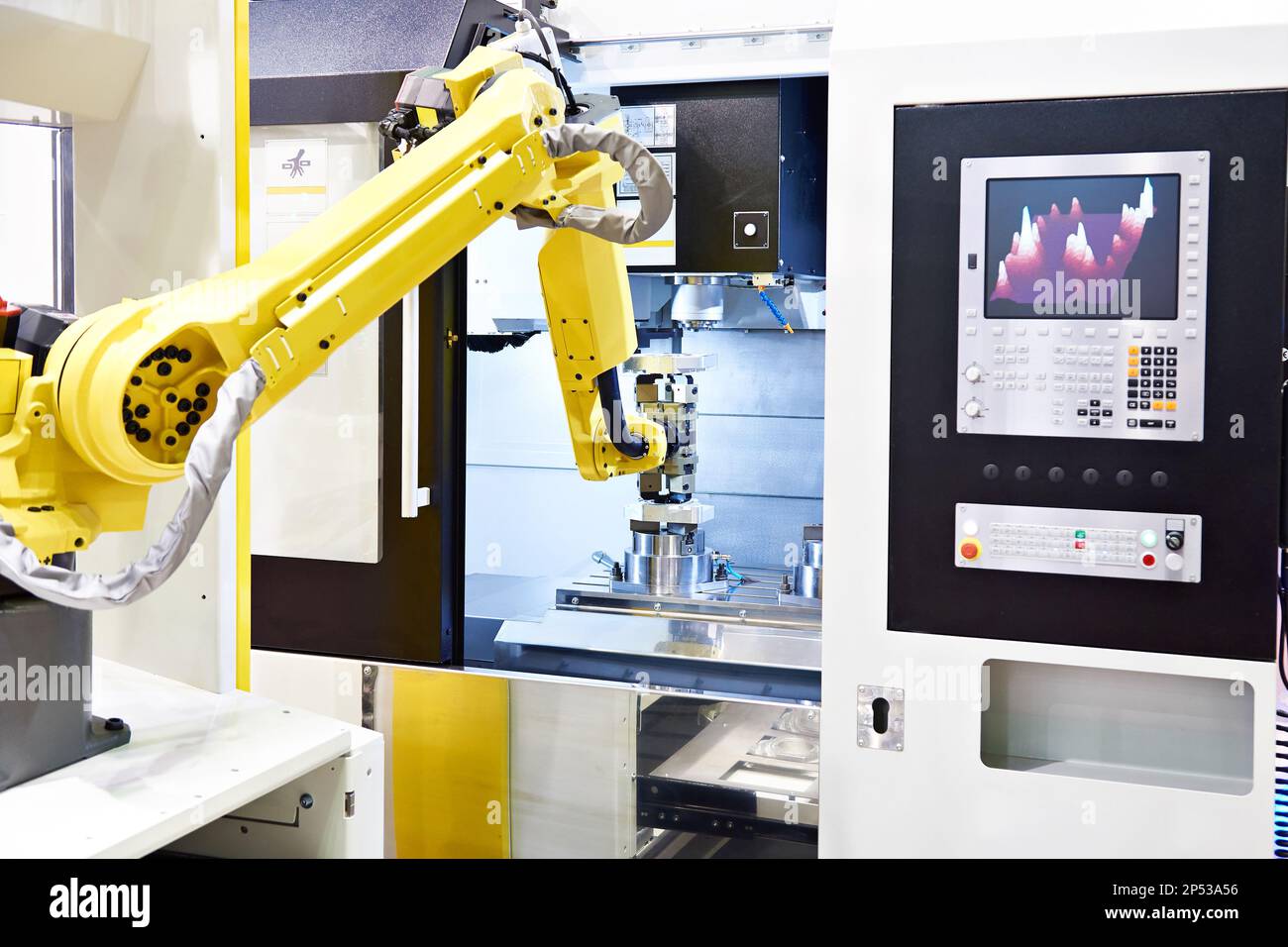 Robotic arm and vertical milling center with linear guides Stock Photo ...