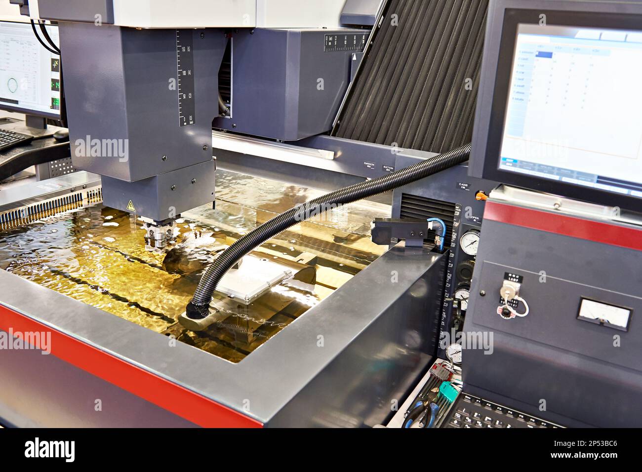 Die-sinking Electrical Discharge Machine with liquid box Stock Photo ...