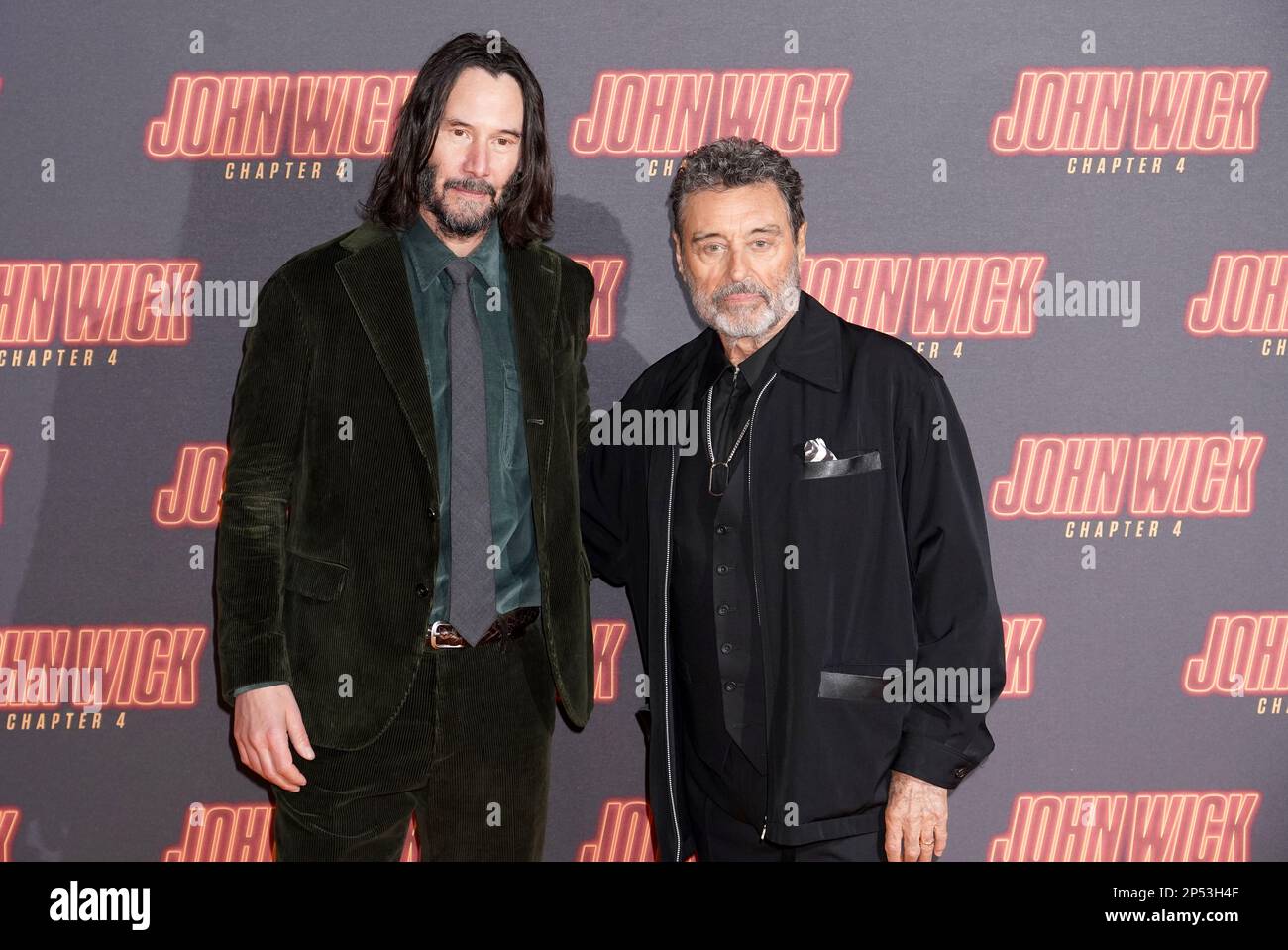 Keanu Reeves (left) and Ian McShane attending the gala screening of ...