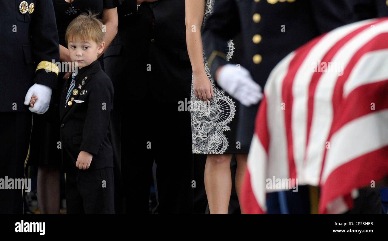 Kaden Bowden, son of U.S. Army Staff Sgt. Joshua J. Bowden, looks at ...