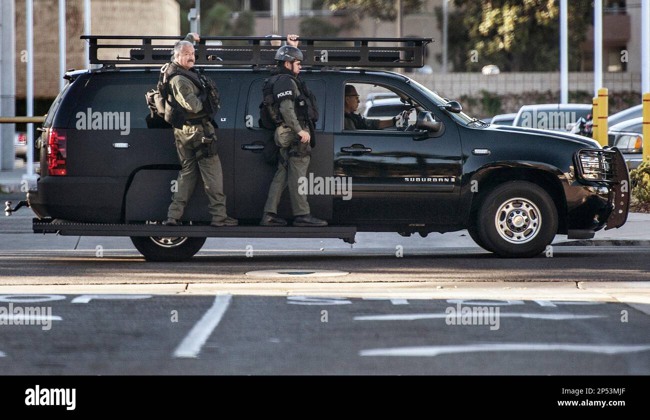 A SWAT team arrives at the Santa Ana Police Department after an early ...
