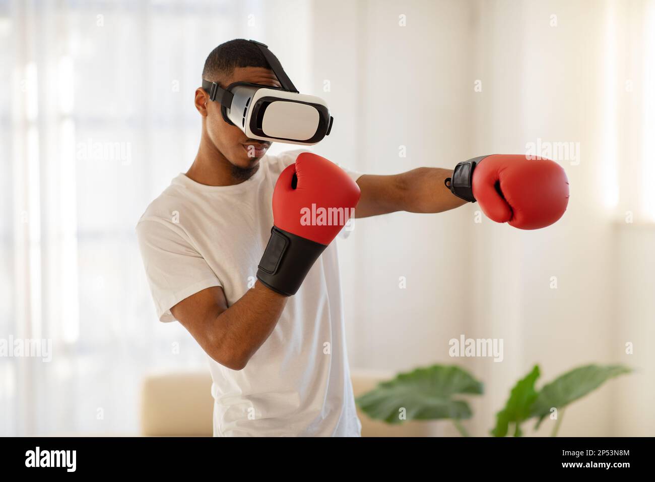 Virtual boxing gloves hi-res stock photography and images - Alamy
