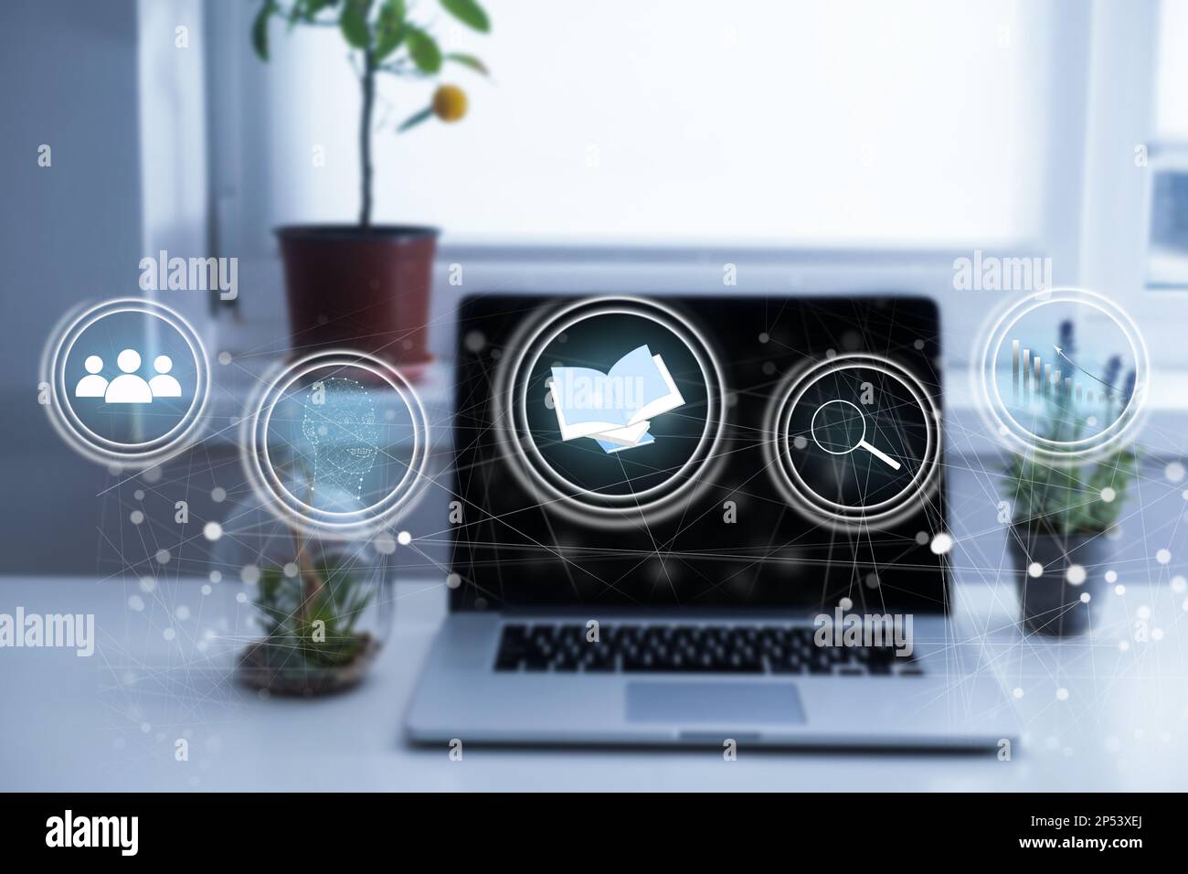 laptop computer and tablet in modern office with virtual icon diagram ...