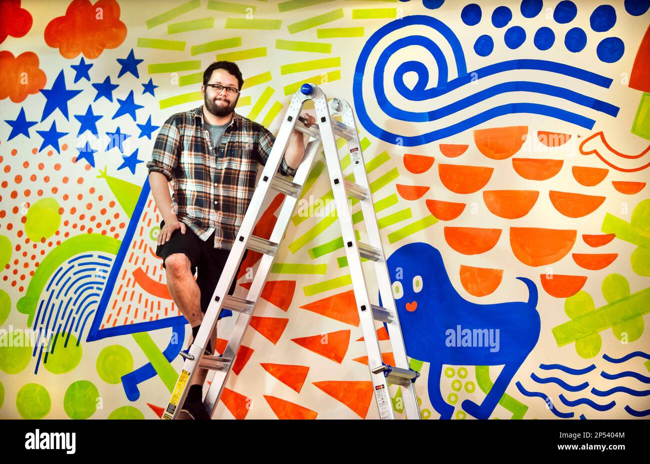 Cartoonist and artist Andy Miller, pictured Wednesday, Sept. 18, 2013 ...