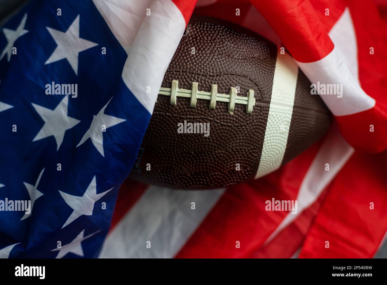 American football rugby ball on usa flag. Sports game Stock Photo - Alamy