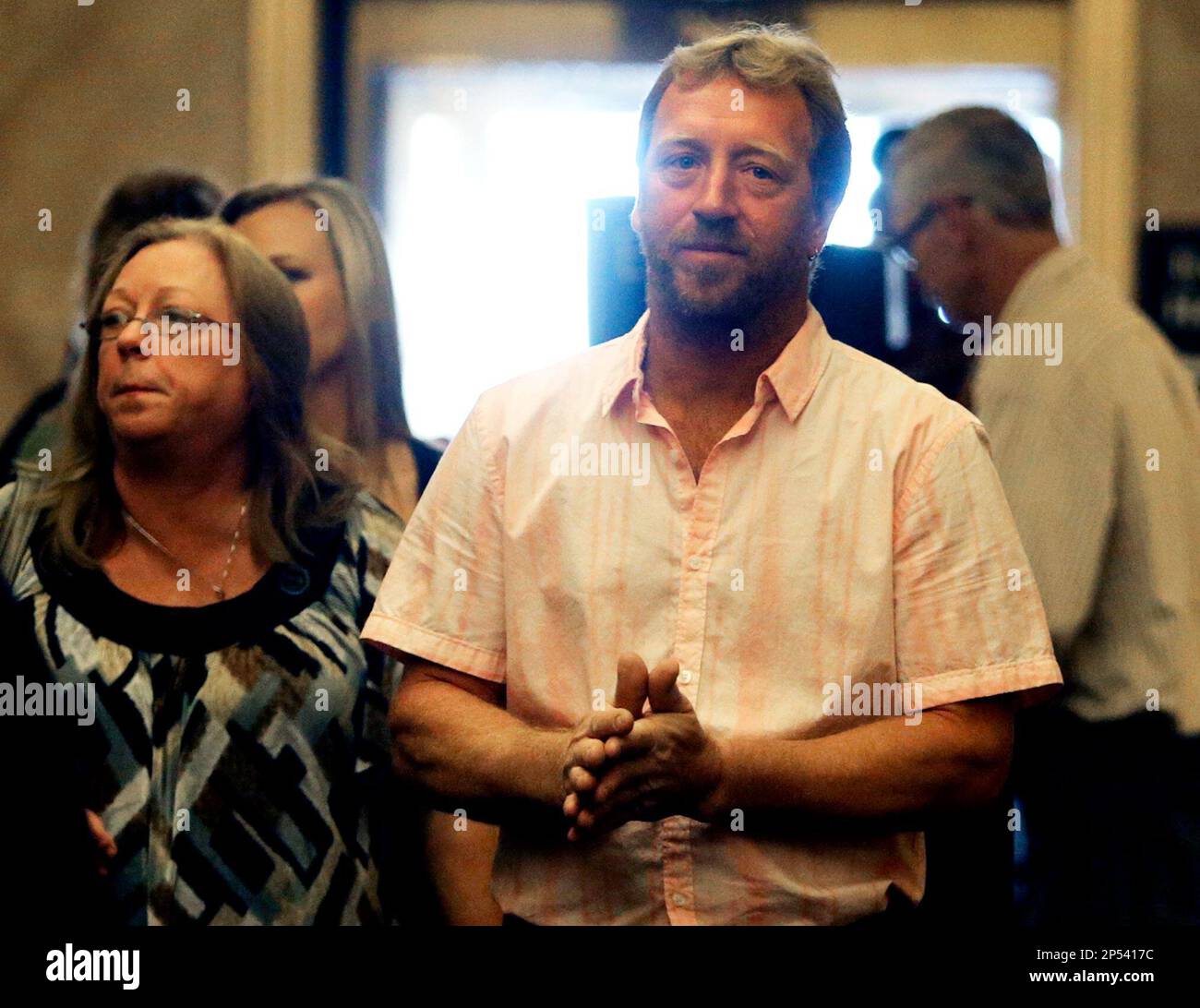 Jay Steger, second from right to left, and Marcie Steger, parents of ...