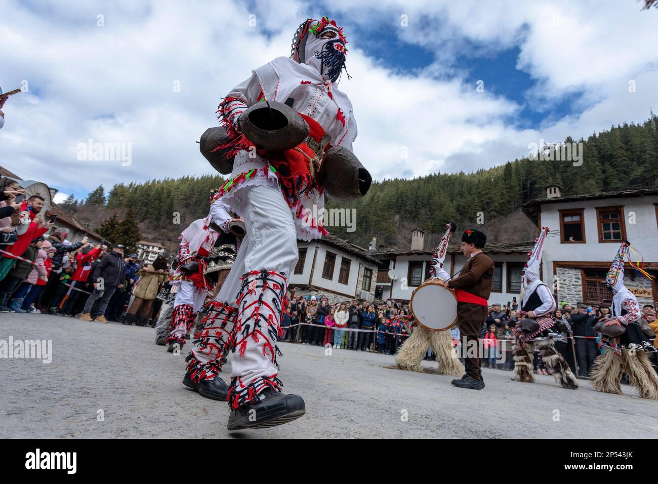 Shiroka Laka, Bulgaria - March 05, 2023: Masquerade festival in Shiroka Laka Bulgaria. People ...