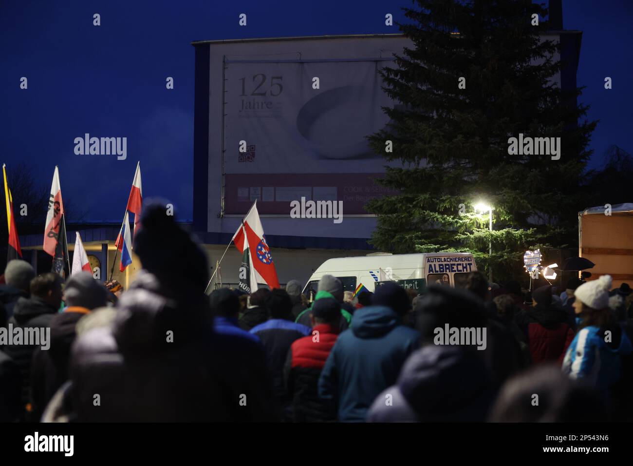 Triptis, Germany. 06th Mar, 2023. Participants stand outside the gates ...