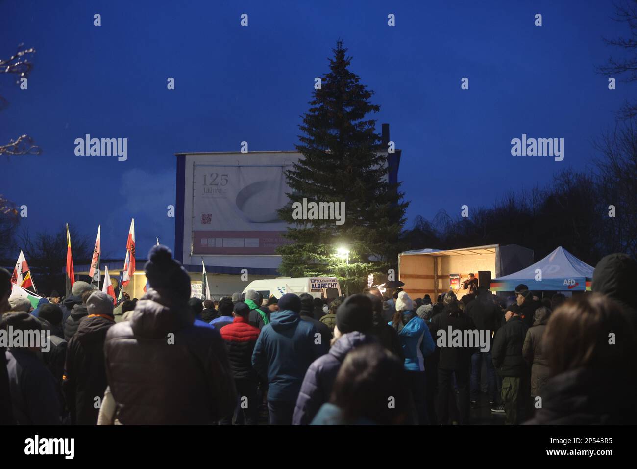 Triptis, Germany. 06th Mar, 2023. Participants stand outside the gates ...