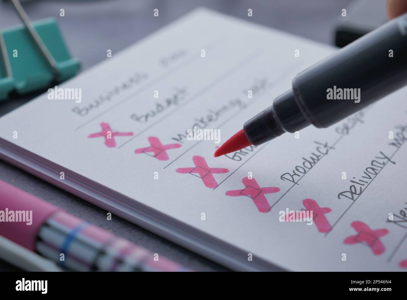 hand drawn red cross on notepad Stock Photo - Alamy