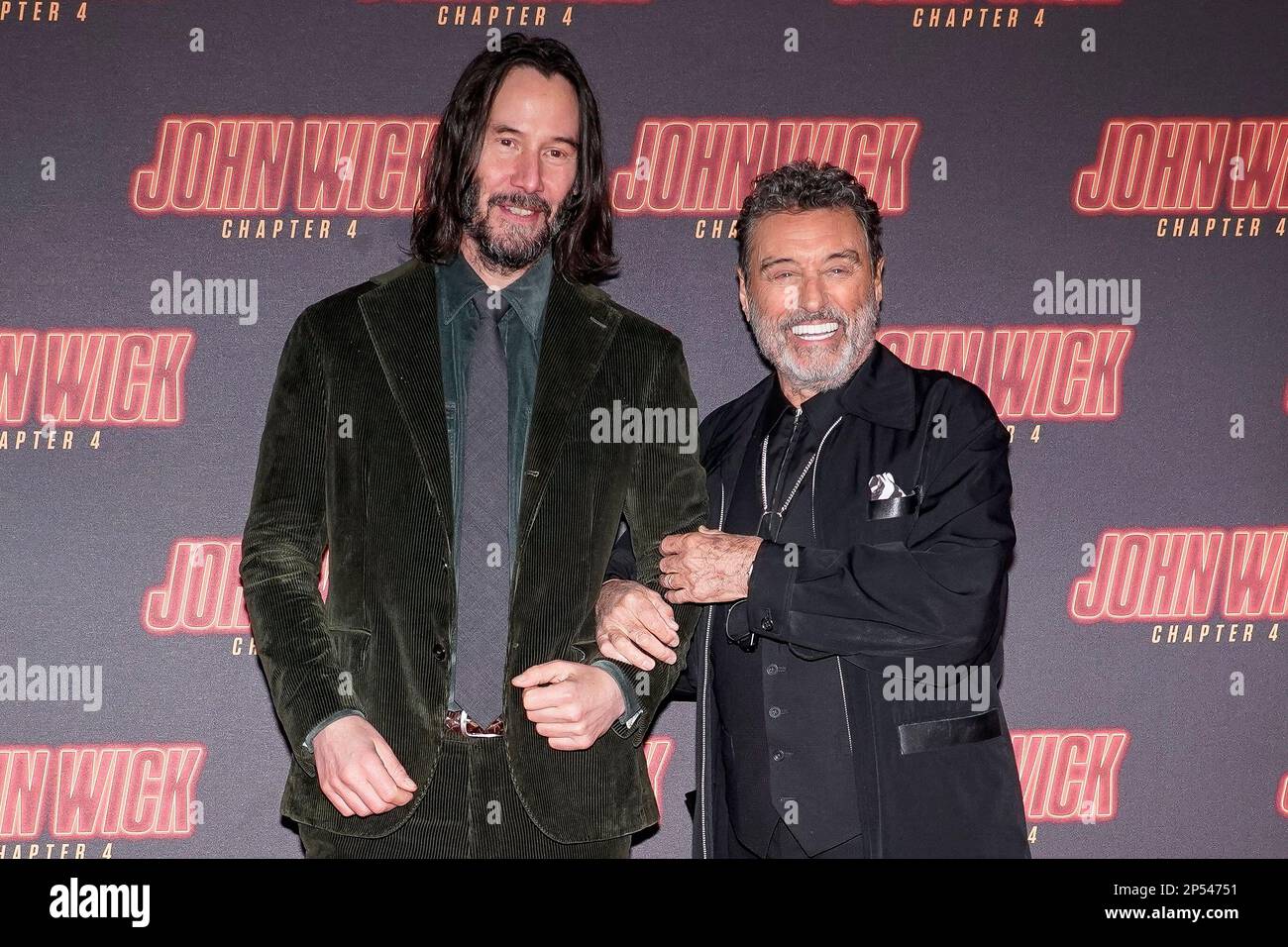 Ian McShane, right, and Keanu Reeves pose for photographers upon ...