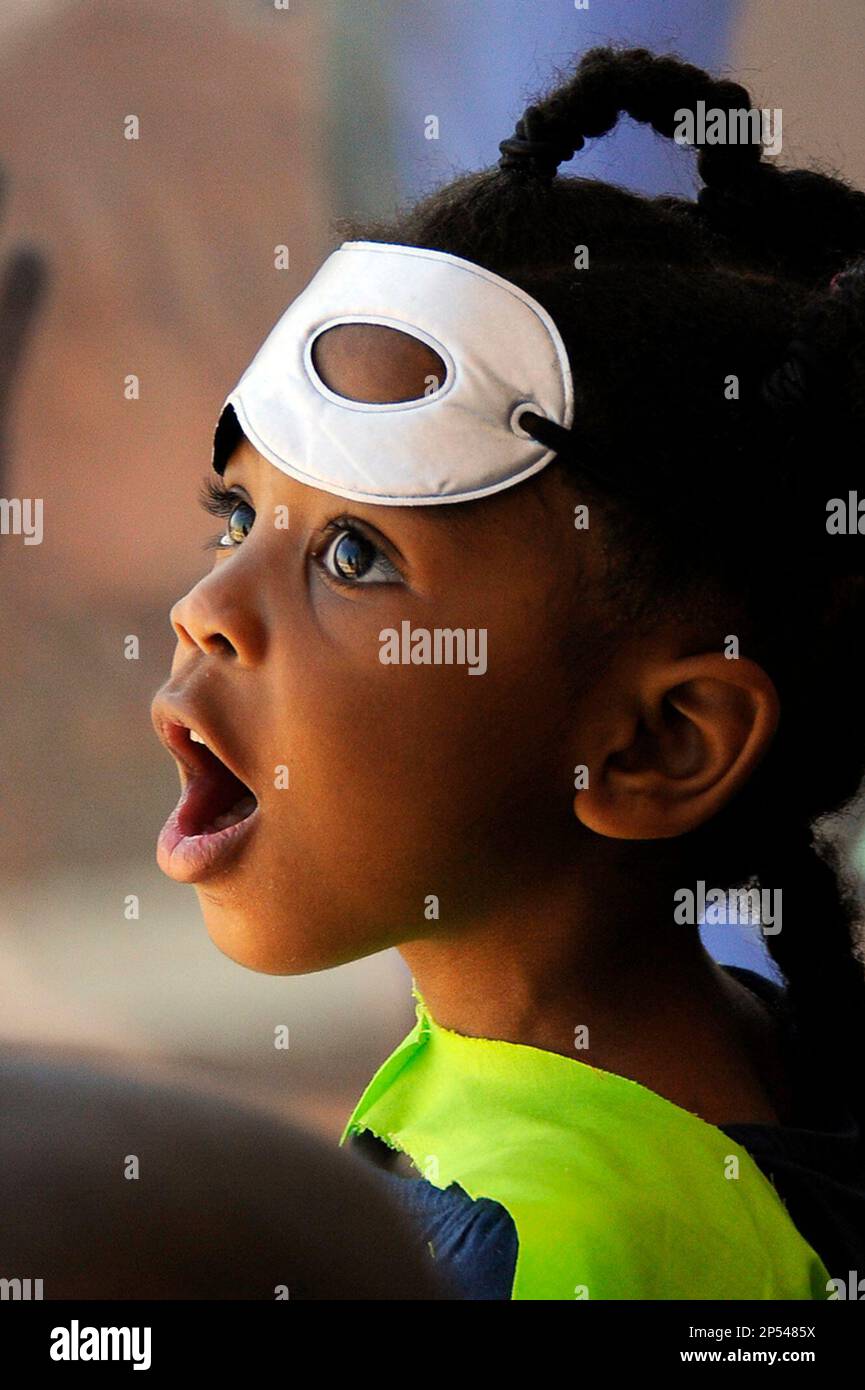 Makayla Carlin, 3, gazes at a Squeegee Cleaning Services of Chelsea ...