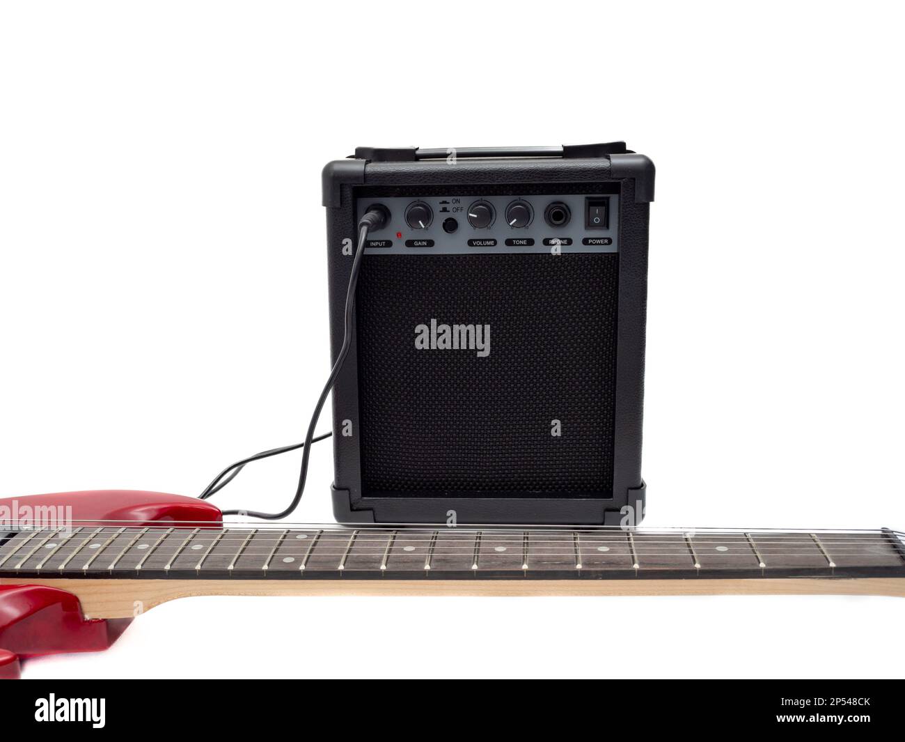 Red electric guitar and classic amplifier. Musical instrument guitar ...