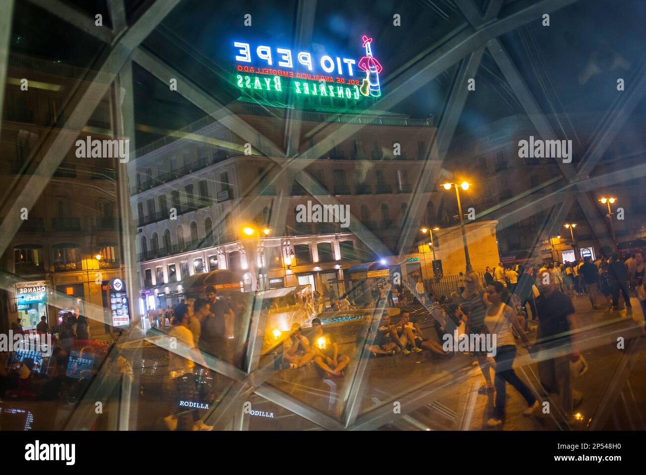 View of Puerta del Sol through the subway Sol Vodafone station. Madrid ...
