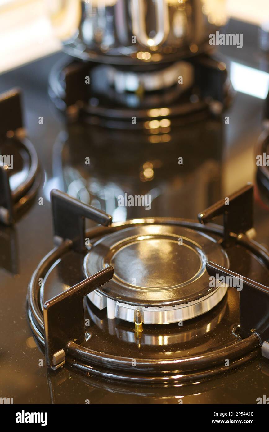 gas stove letting out of blue flame Stock Photo - Alamy