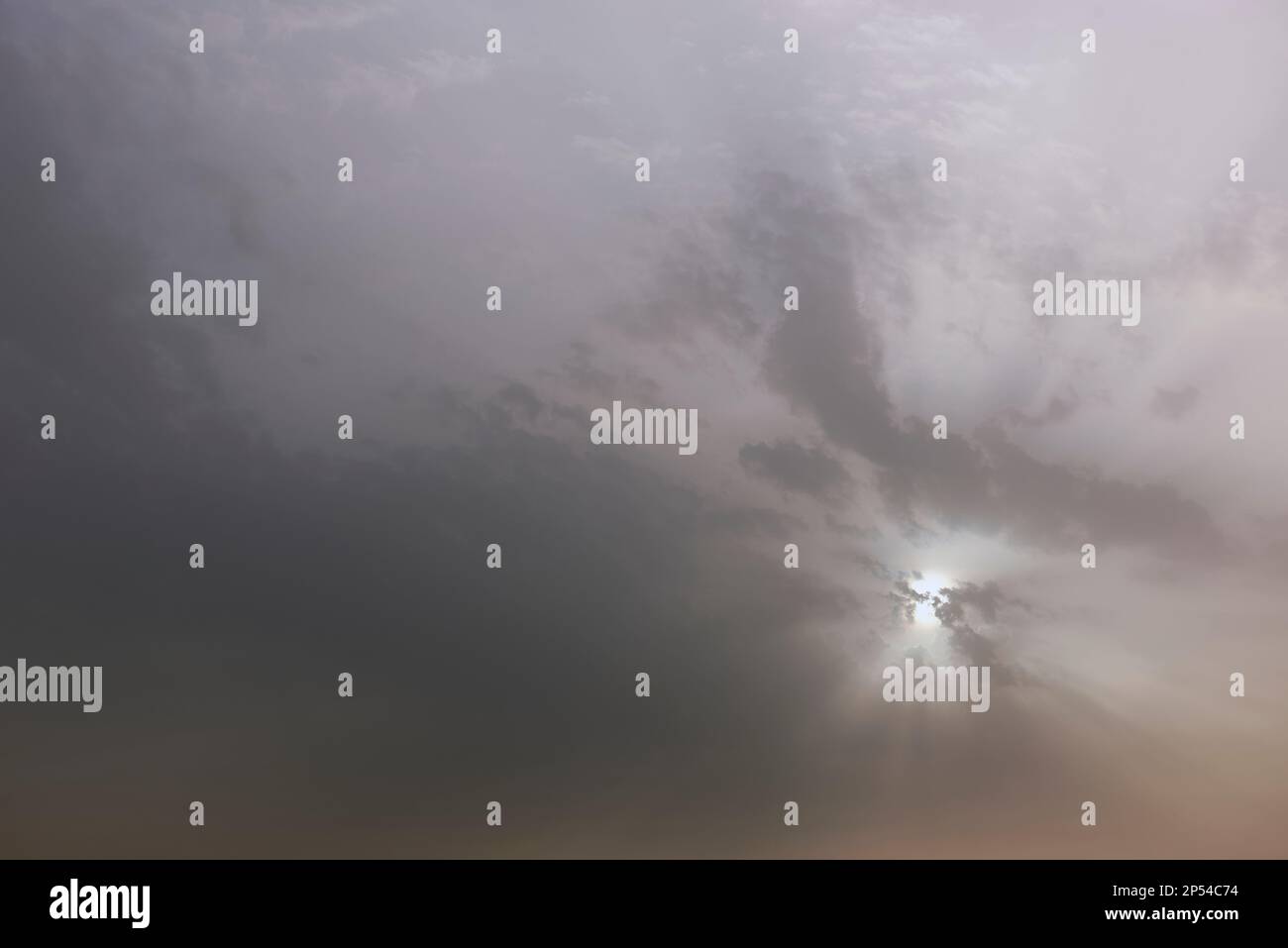 Sky, with diffused sun clouds colourful Stock Photo - Alamy