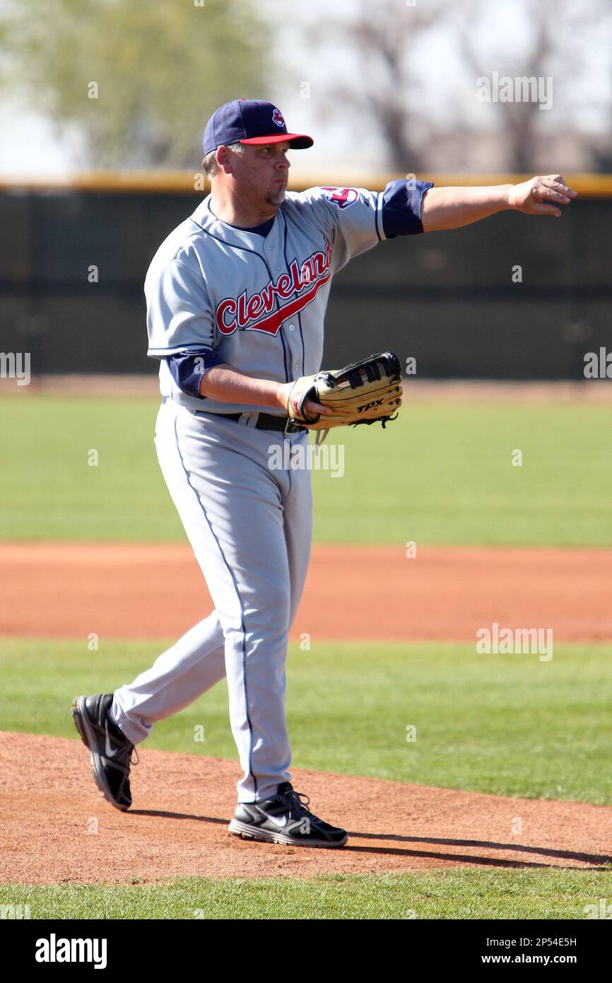 Former major league pitcher Greg Swindell pitches to campers during the ...