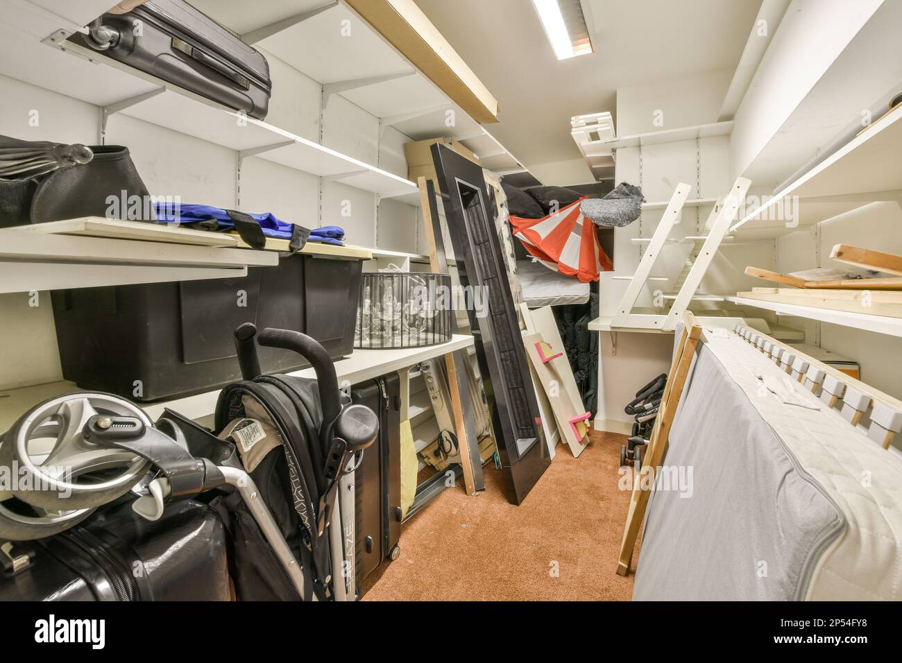 the inside of a room that is being used as a storage area for various ...