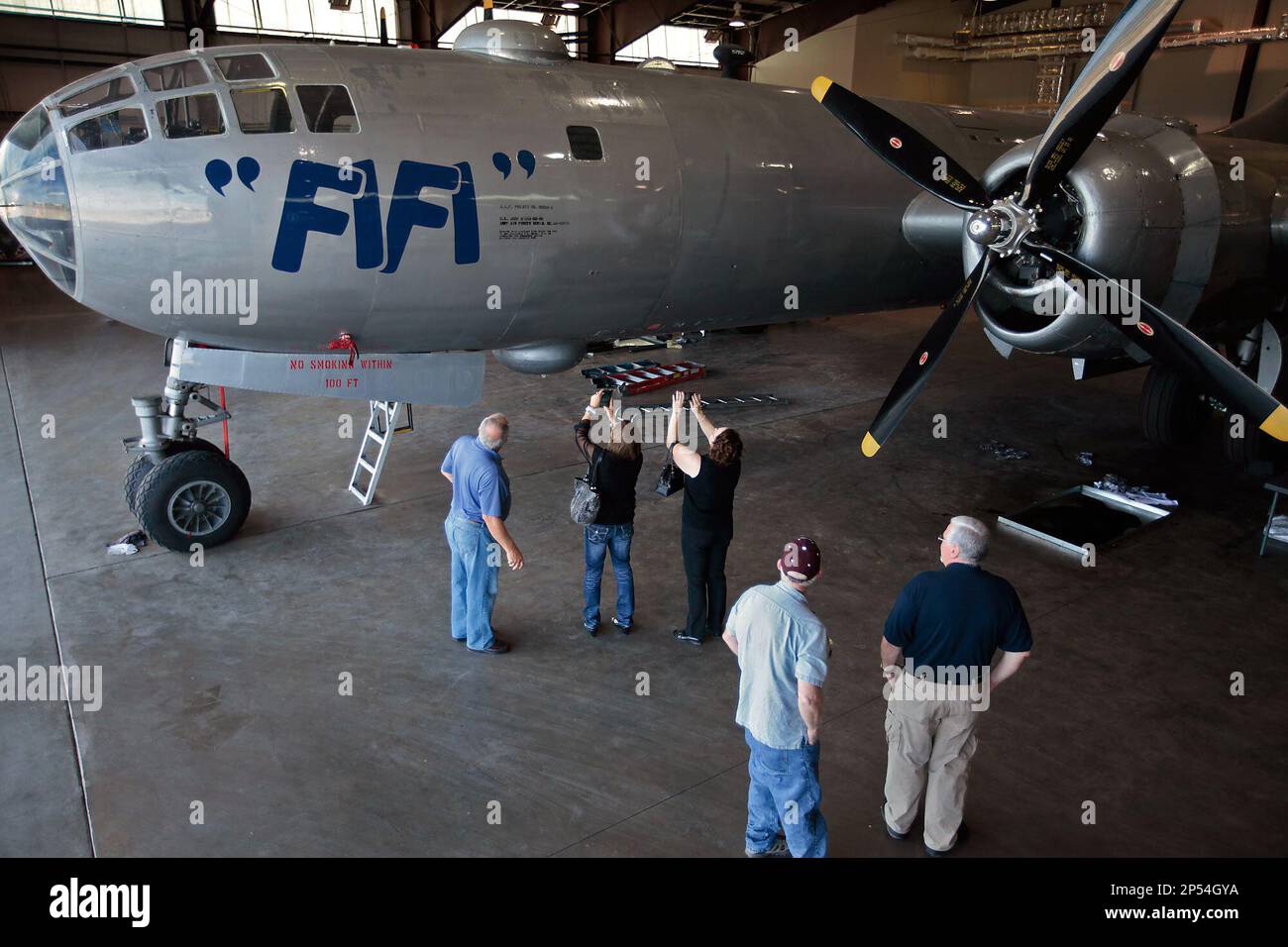 In this Sept. 12, 2013 photo, members a tour take pictures of "Fifi ...