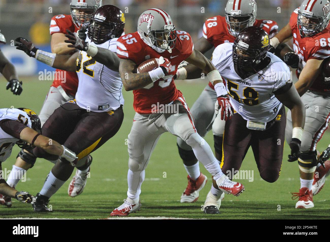 UNLV running back Tim Cornett (35) breaks free from Central Michigan's ...