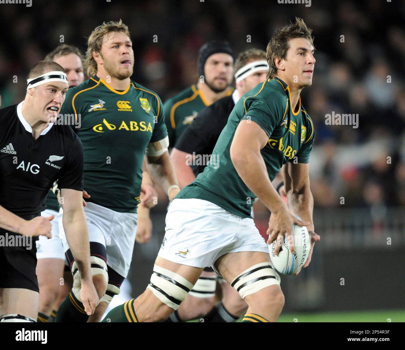 South Africa's Eben Etzebeth, right, carries the ball against New ...