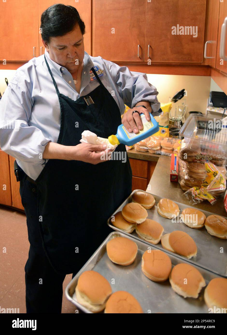 HEB employee, David Ochoa prepared hamburger buns at Brownsville Fire ...