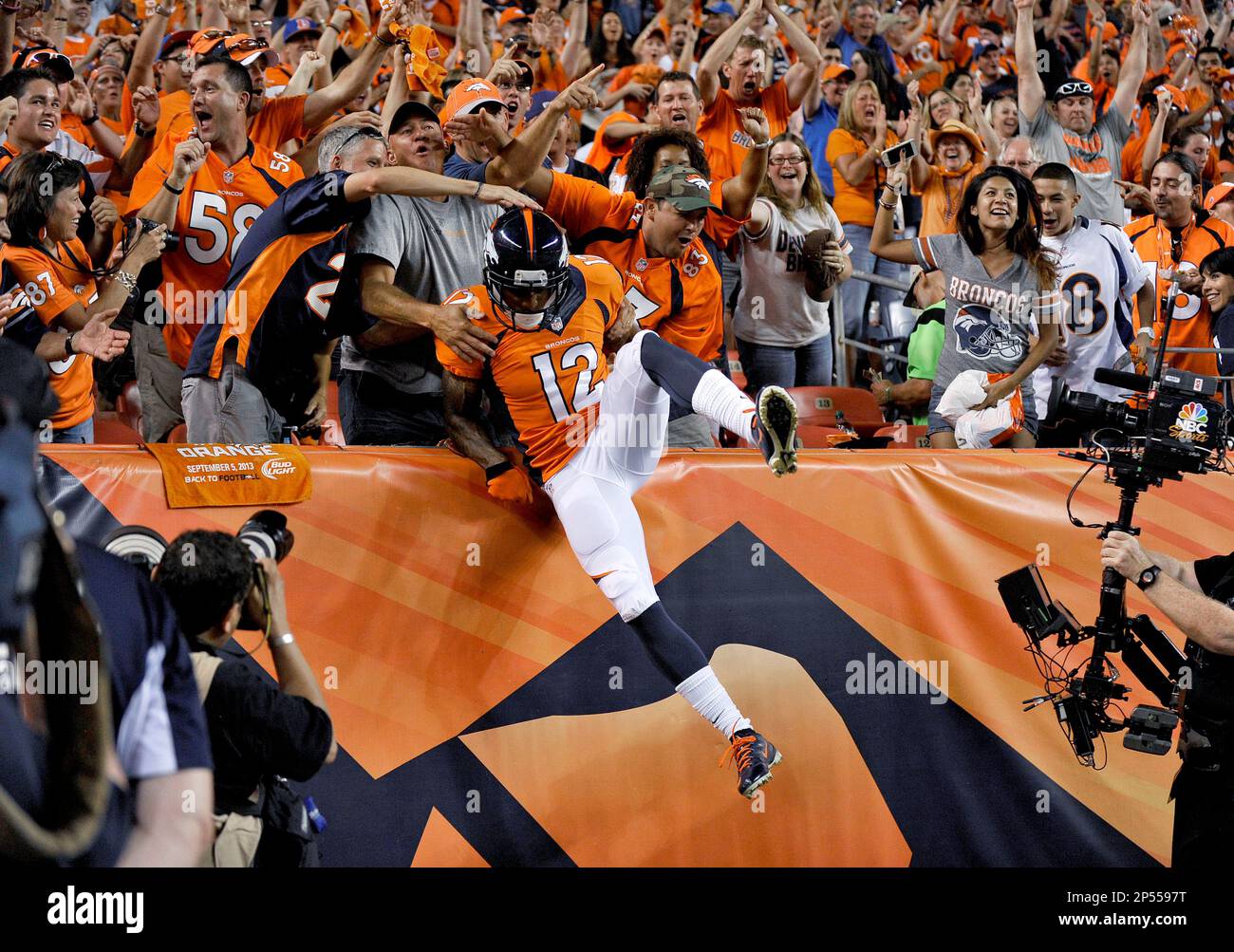 Denver Broncos wide receiver Andre Caldwell (12) is congratulated by ...