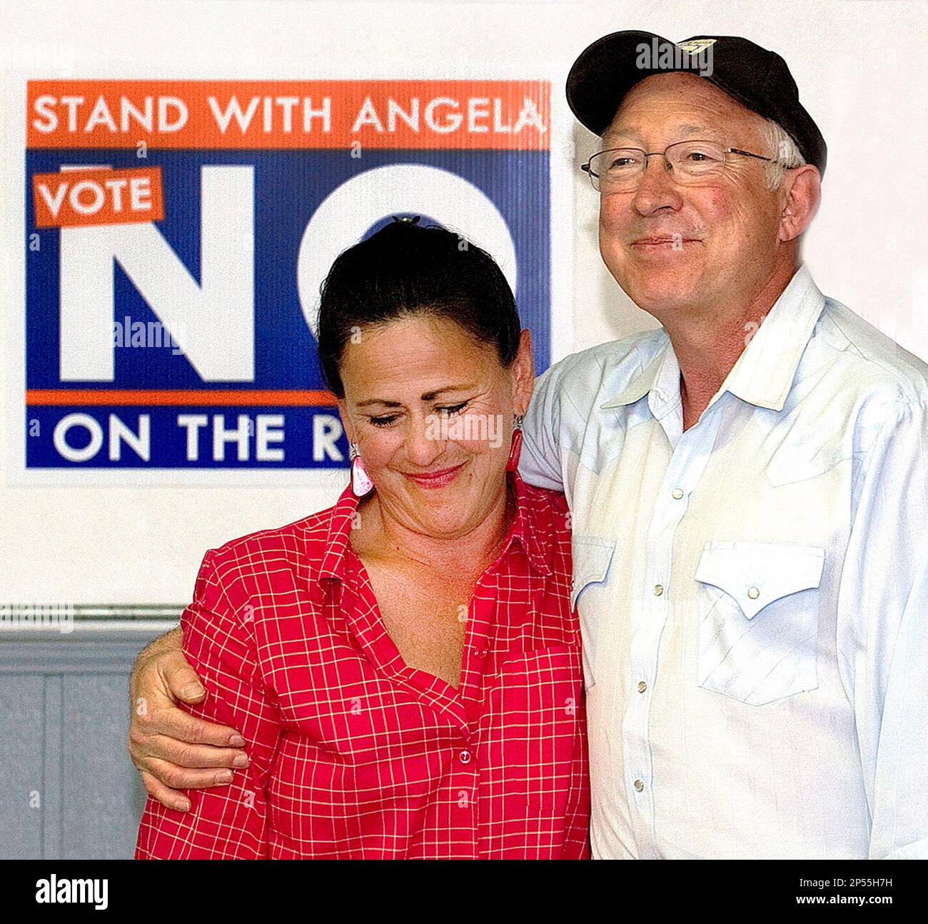 Ken Salazar, right, hugs Colorado State Sen. Angela Giron Sunday, Sept ...