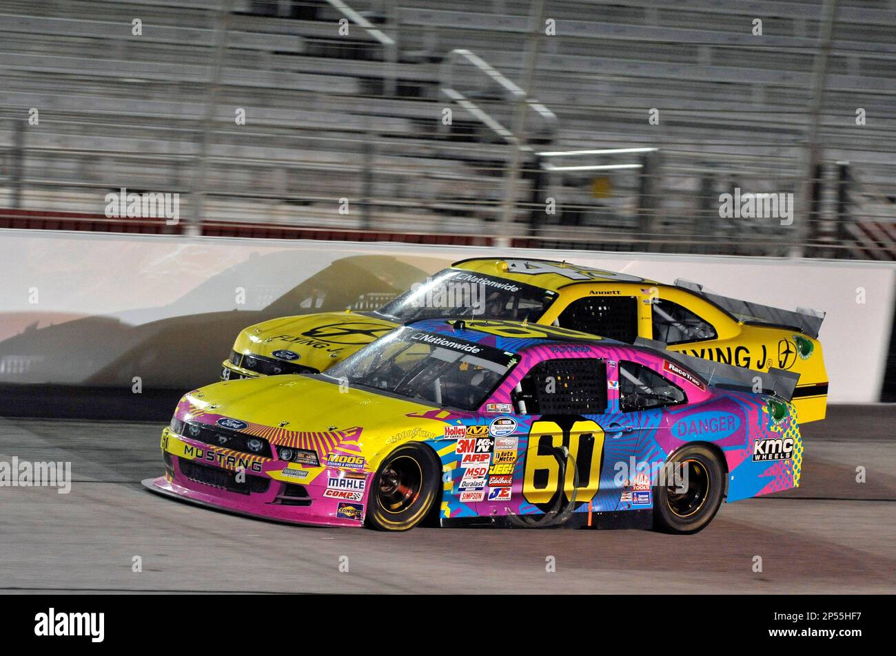 Travis Pastrana (60) and Michael Annett (43) during the NASCAR ...