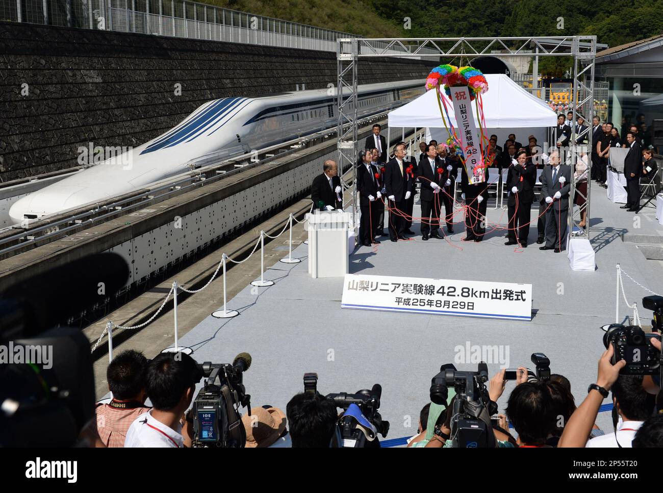 Officials of the JR Tokai attend the ceremony of the L0 linear train's ...