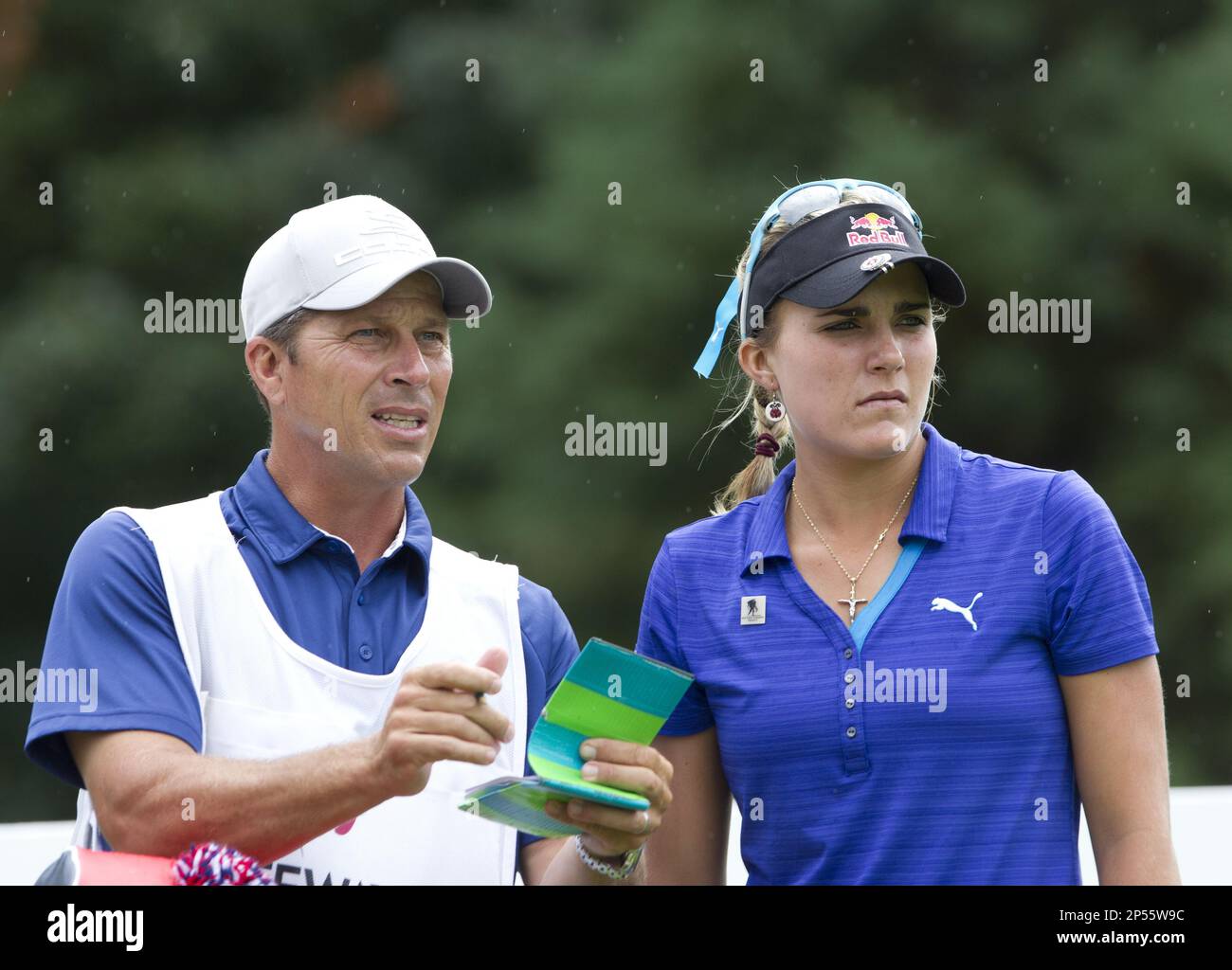 Lexi Thompson, 18, stands with caddie Greg Johnston, during the 2013 ...