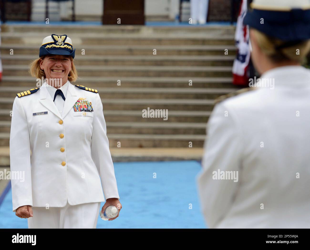 United States Coast Guard Captain Andrea Marcille smiles to Coast Guard ...