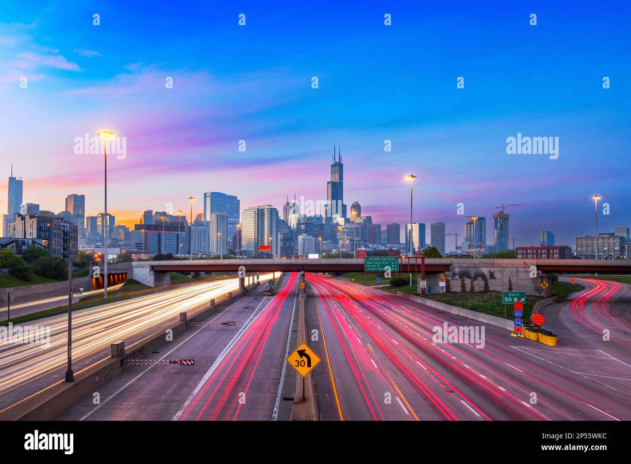 Chicago, Illinois, USA downtown skyline over highways at twilight Stock ...