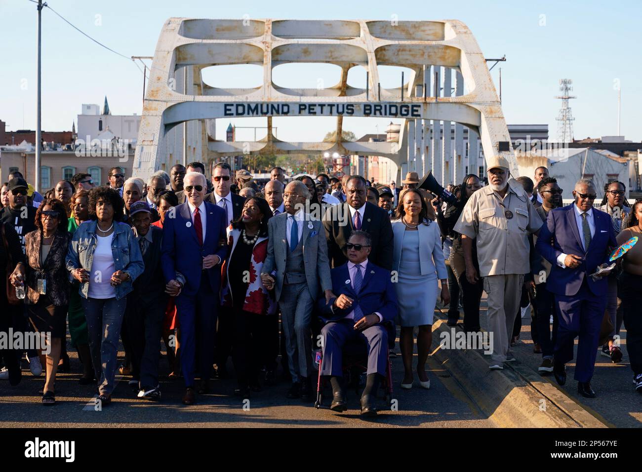 President Joe Biden walks across the Edmund Pettus Bridge in Selma, Ala ...