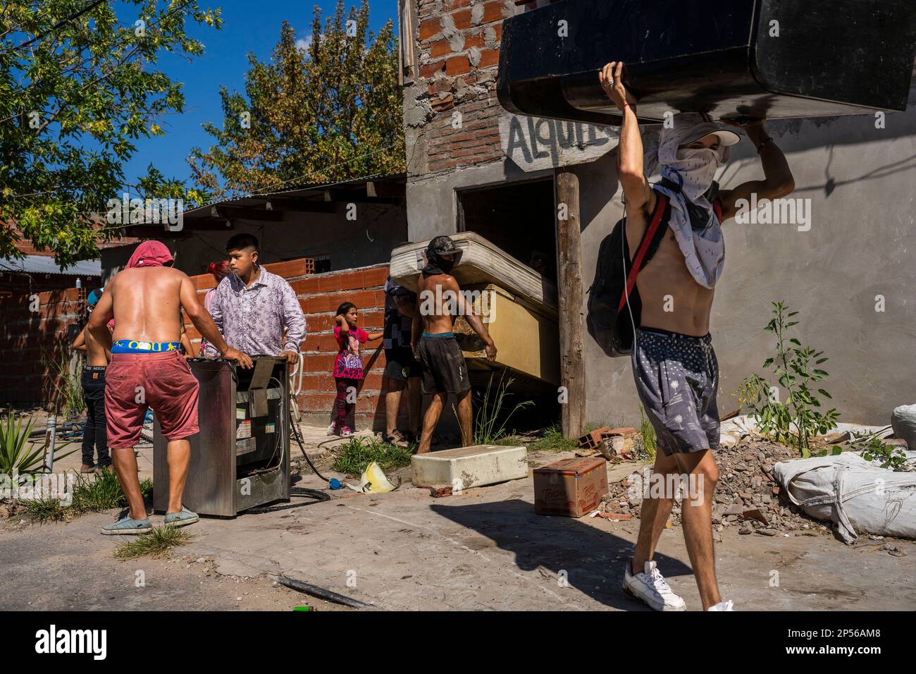 Neighbors and relatives of Maximo Jerez, an 11-year-old boy killed in ...