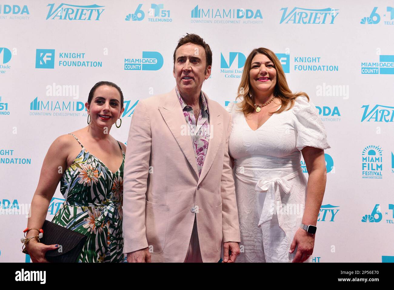MIAMI, FLORIDA - MARCH 05: (L-R) Dr. Anay Abraham, Nicolas Cage and ...