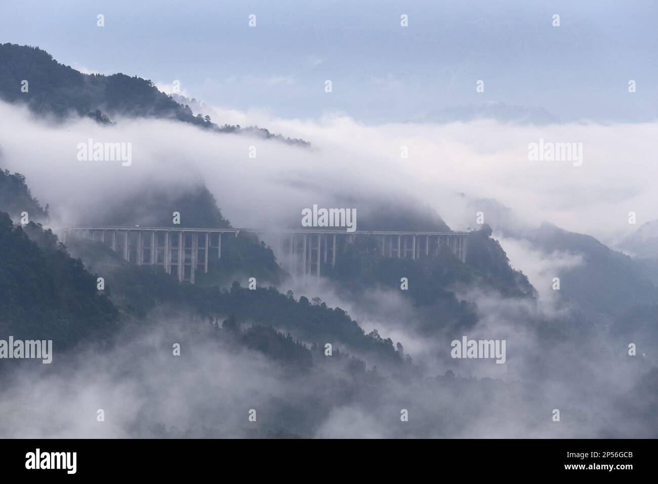 A view of the 229-metre-high concrete beam bridge Labajin Bridge, part ...