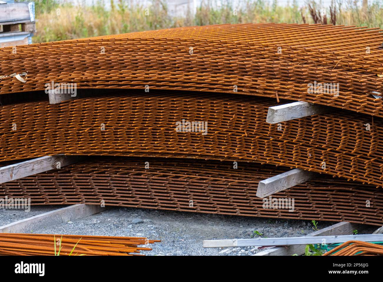 Piles of rusty rebar ready to be used at a construction site Stock ...