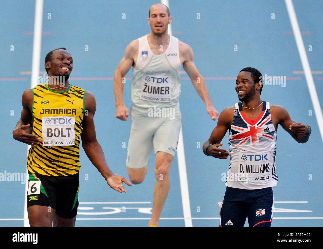 Jamaica's Usain Bolt, left, and Britain's Delano Williams, right, react ...