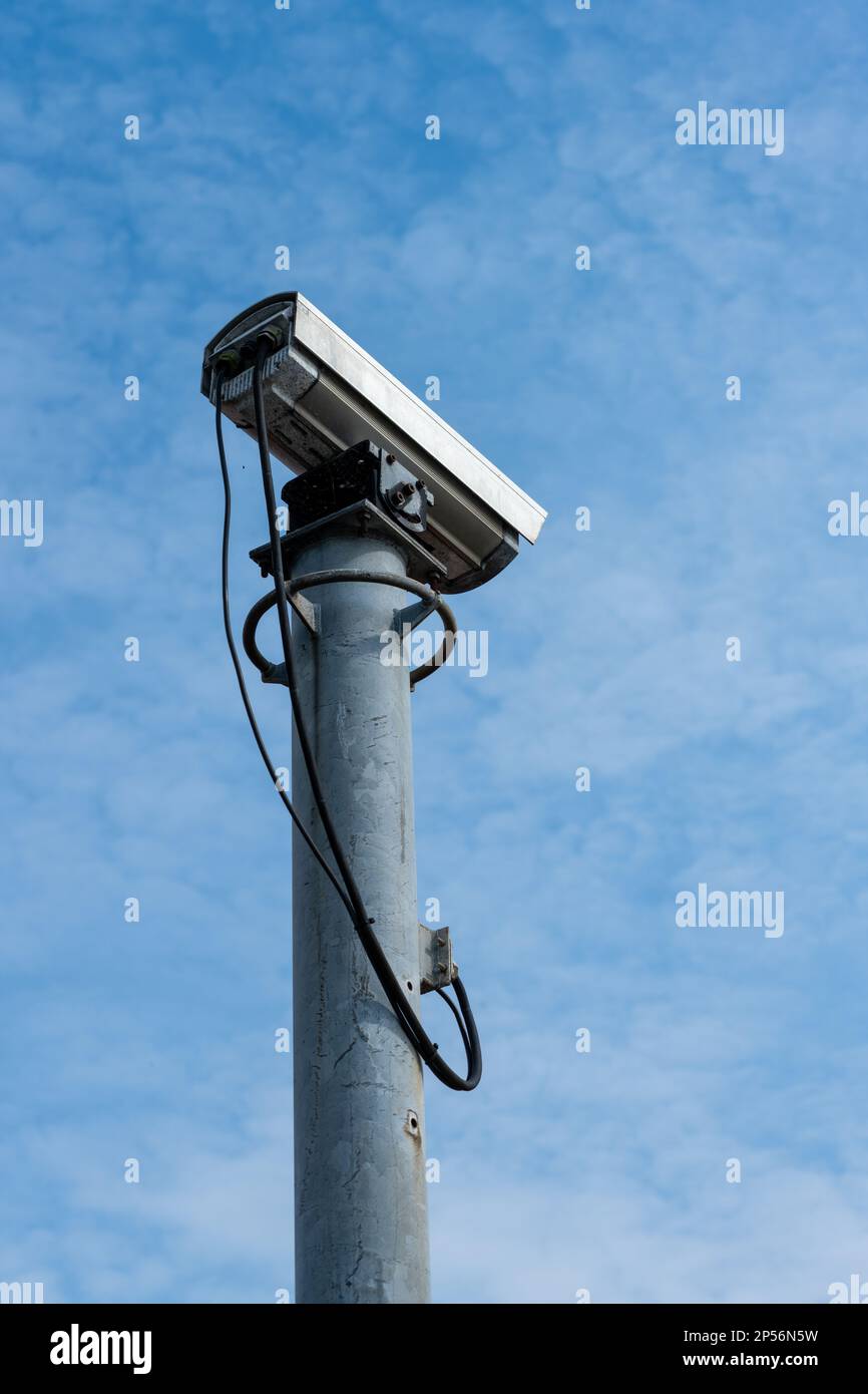 Remote CCTV camera on top of a tall pylon Stock Photo - Alamy