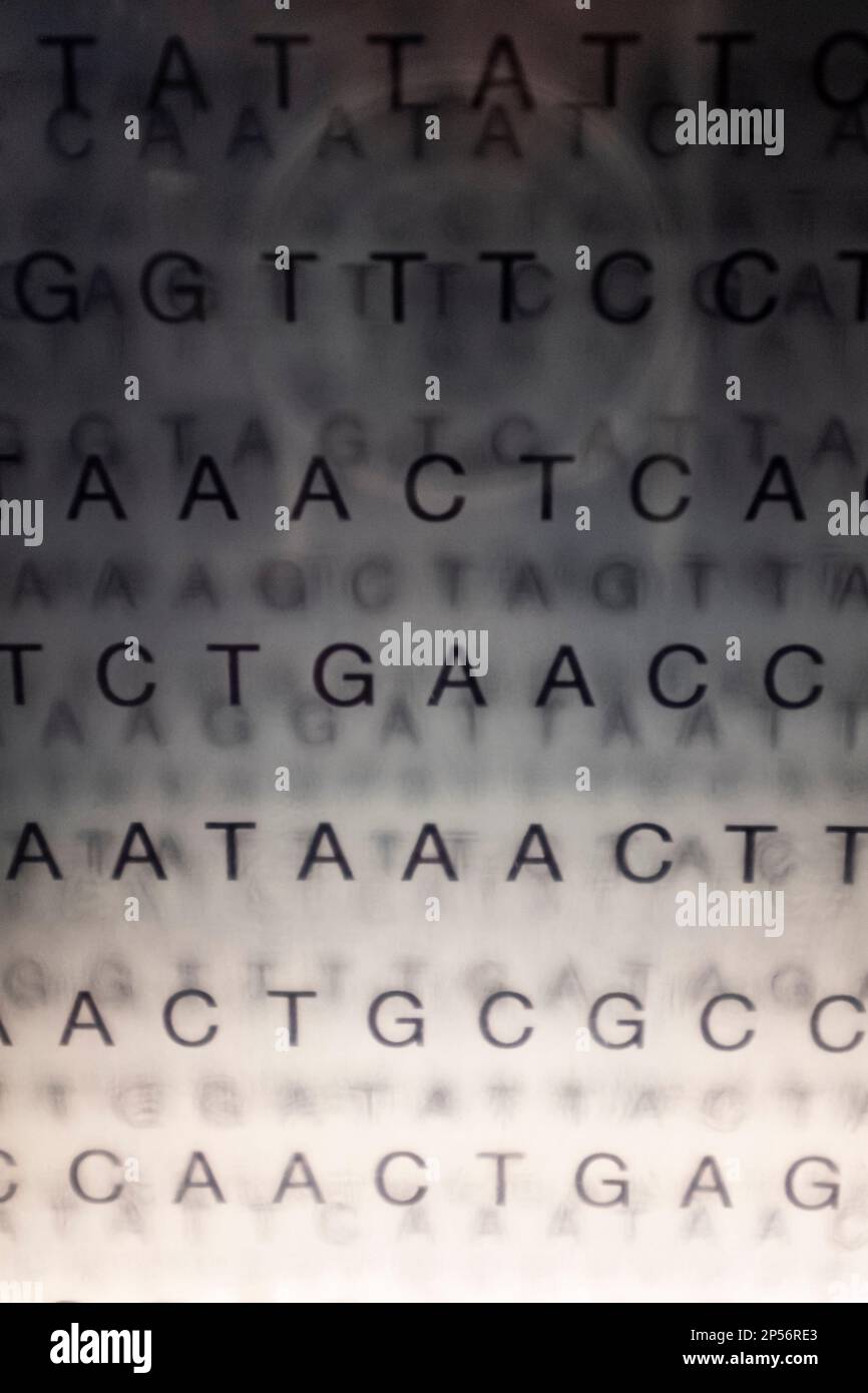 Many letters code DNA on a translucent written surface abstract scene ...