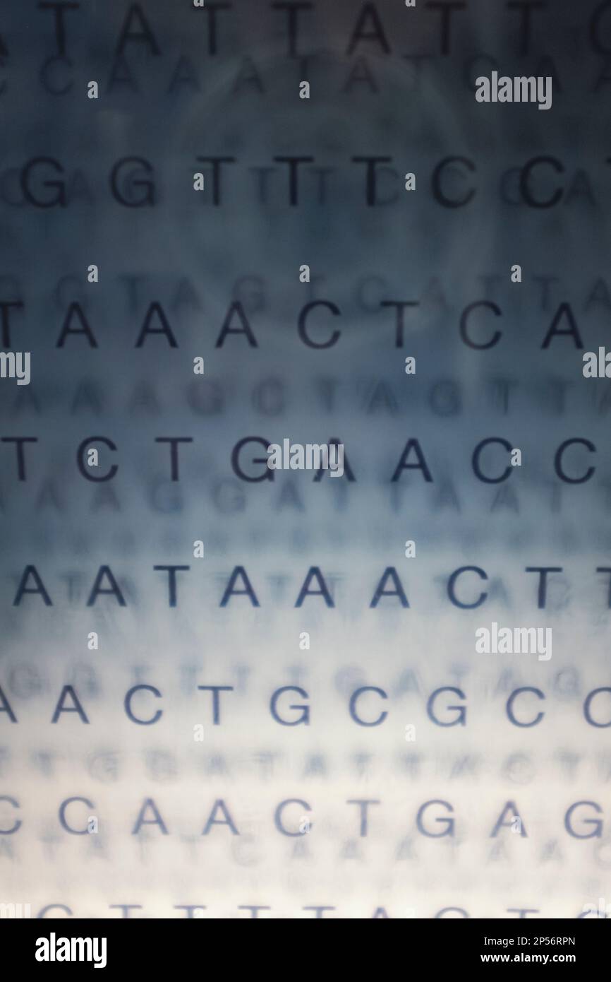 Many letters code DNA on a translucent written surface abstract scene ...