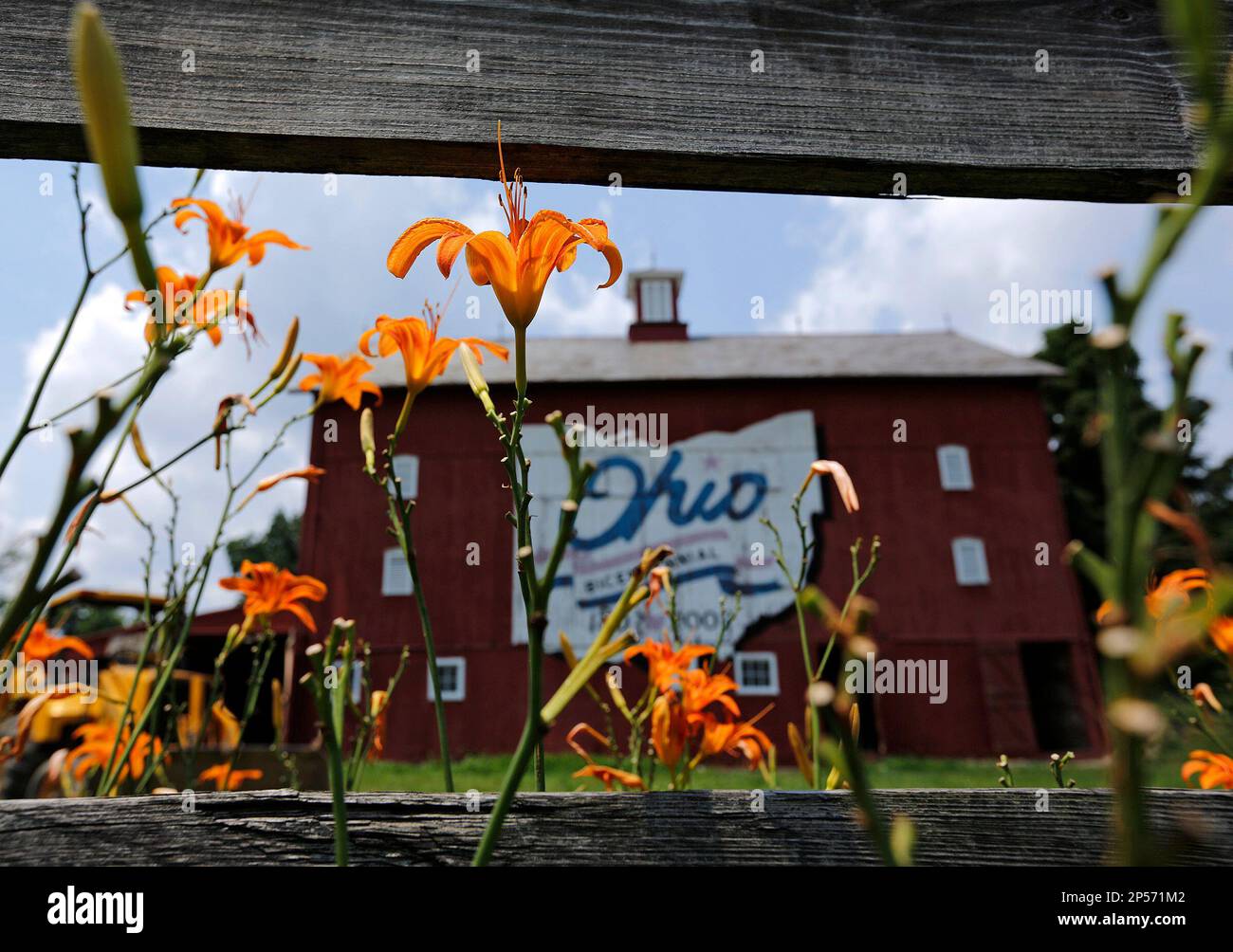 This July 10, 2013 photo show the red barn on the property of Bob and ...