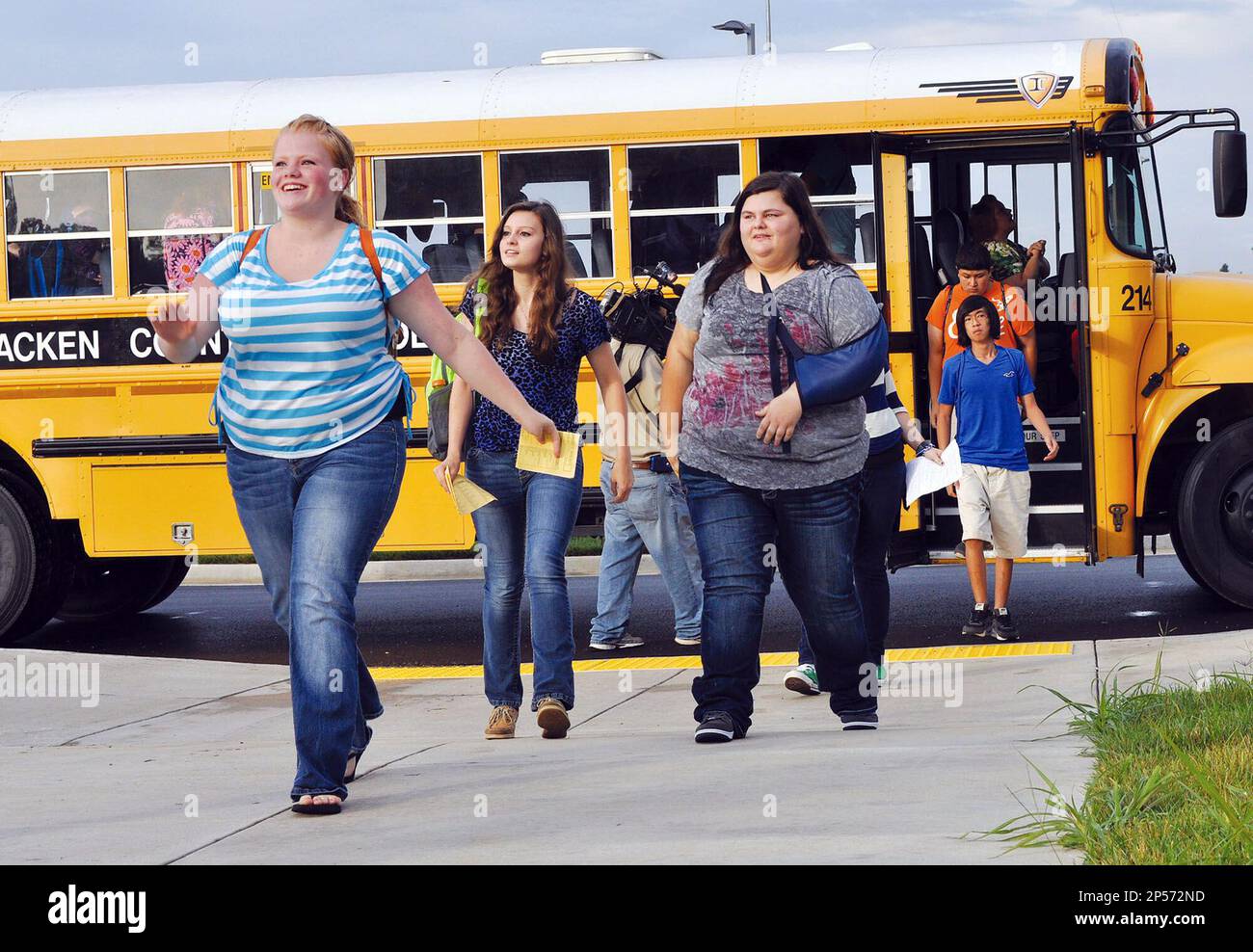 Senior Audrey Atherton leads a group of eager students off of the first ...