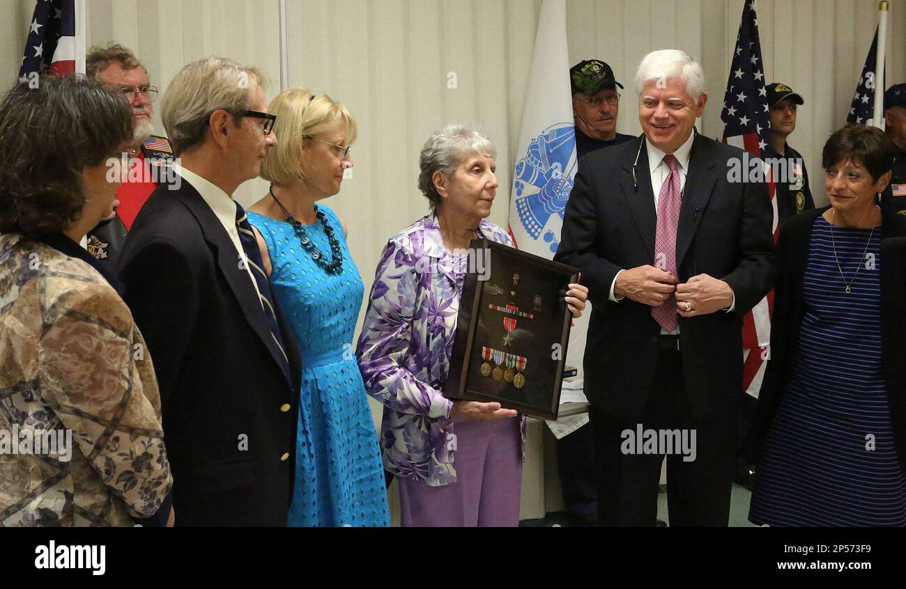 Norma Palmquist, wife of WWII veteran Runo Palmquist holds her husband ...